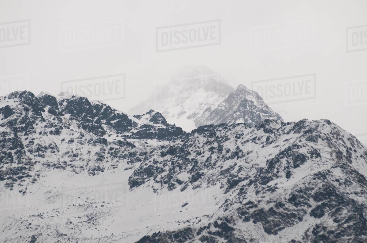 Snow capped misty mountain range, Nepal - Royalty-free Stock Photo ...