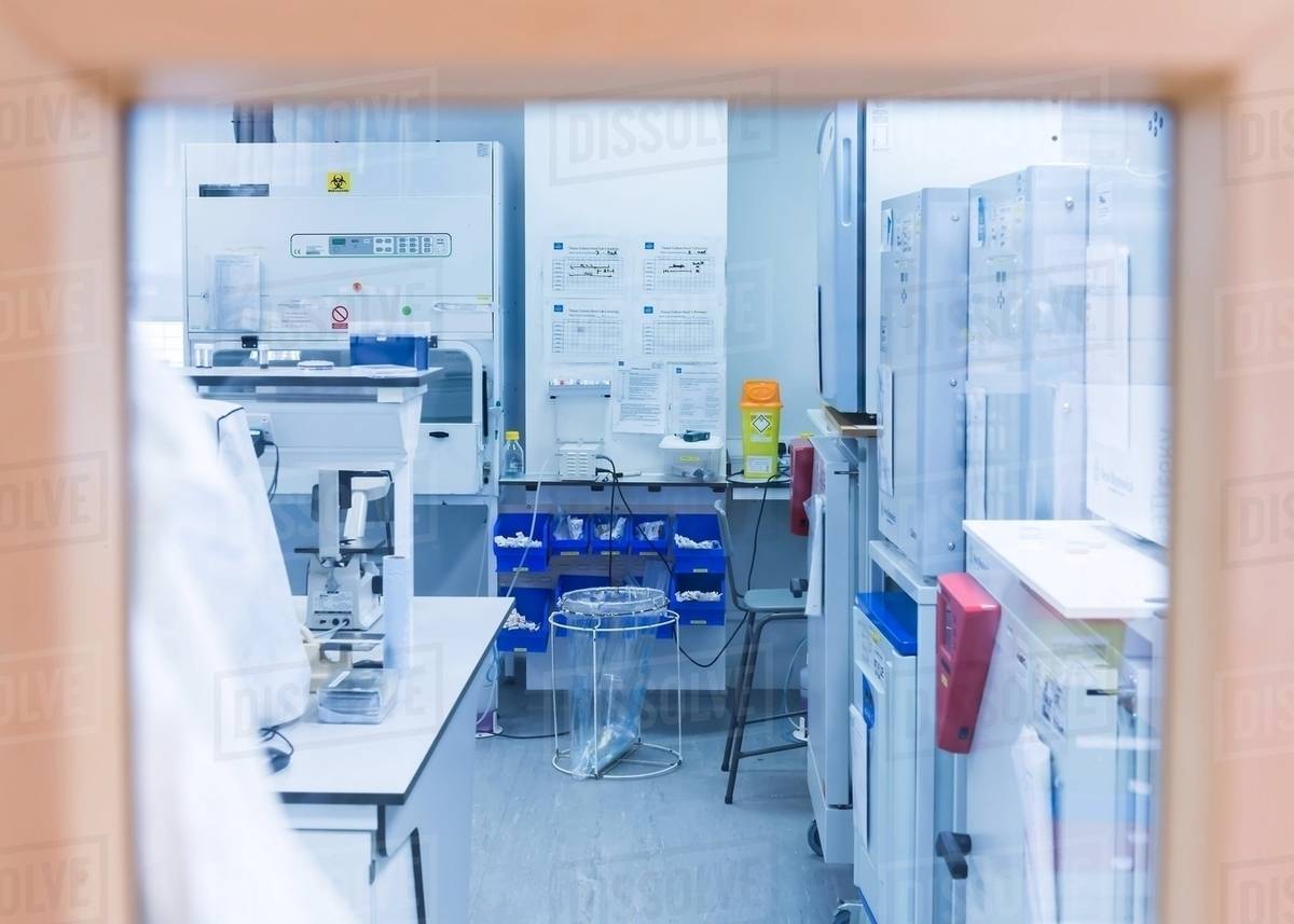 Cancer research laboratory through window - Stock Photo - Dissolve