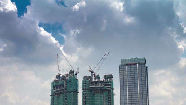 Under construction two buildings timelapse - Stock Video Footage - Dissolve