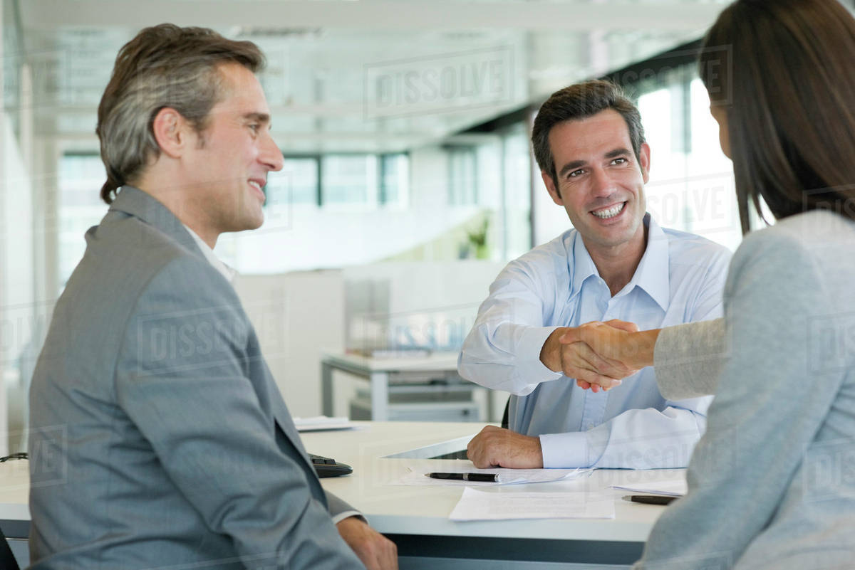 Businessman shaking hands with client - Royalty-free Stock Photo | Dissolve