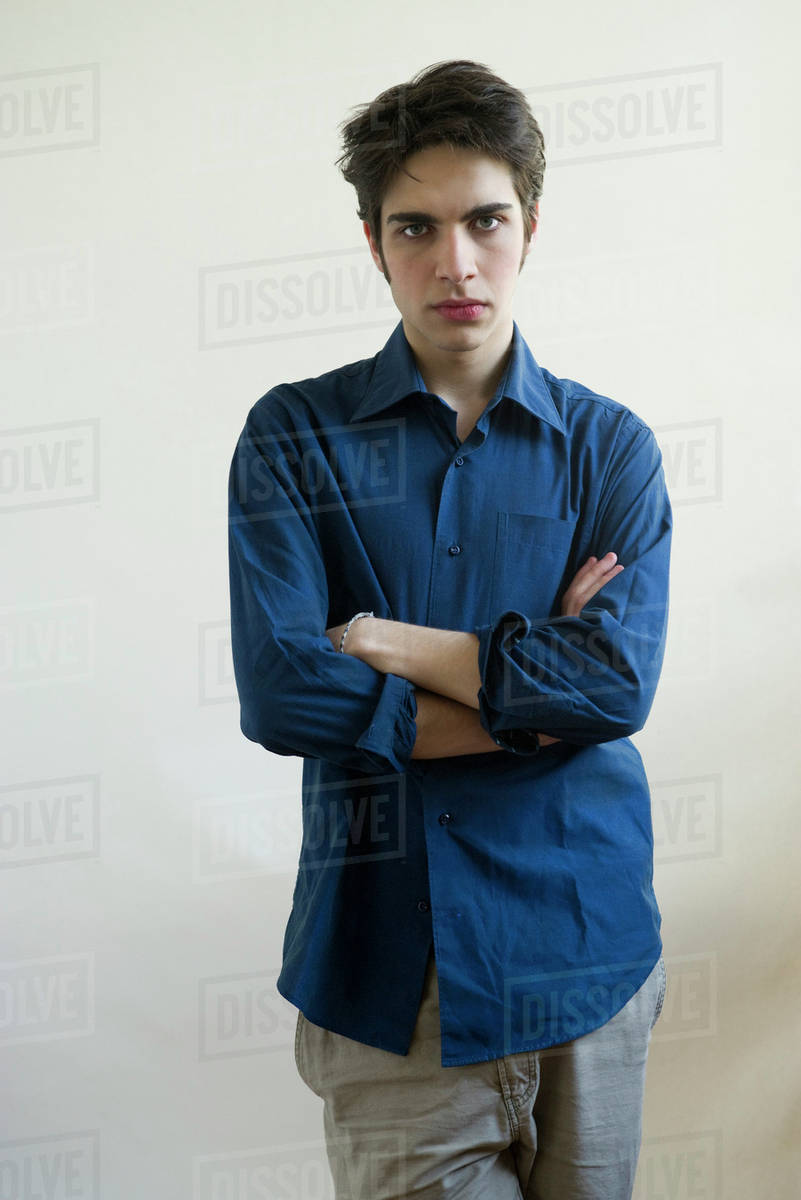 Male with arms folded, portrait - Royalty-free Stock Photo | Dissolve