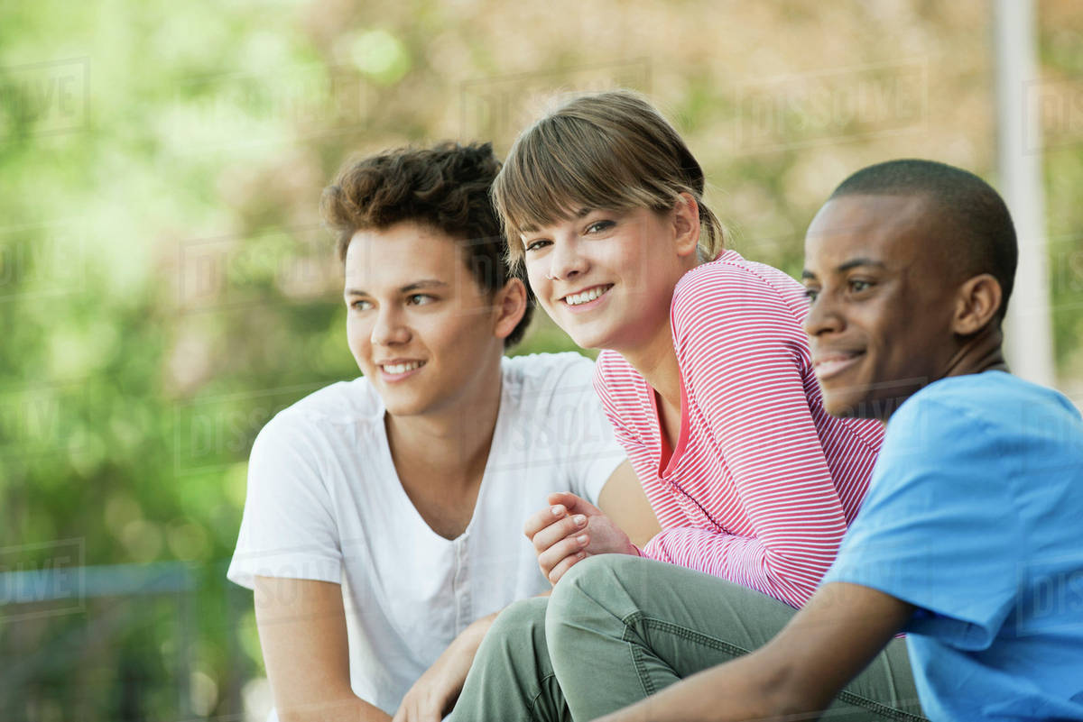 Friends hanging out together - Stock Photo - Dissolve