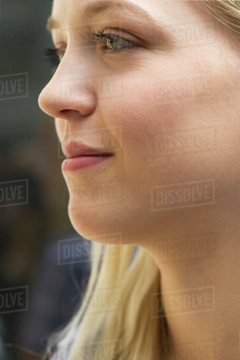 Young woman in profile, portrait - Royalty-free Stock Photo | Dissolve