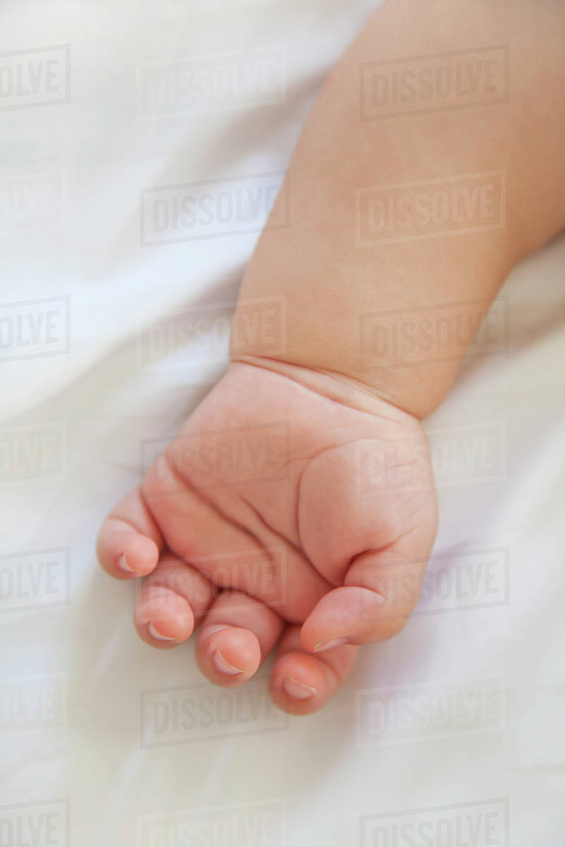 Infant's hand - Royalty-free Stock Photo | Dissolve
