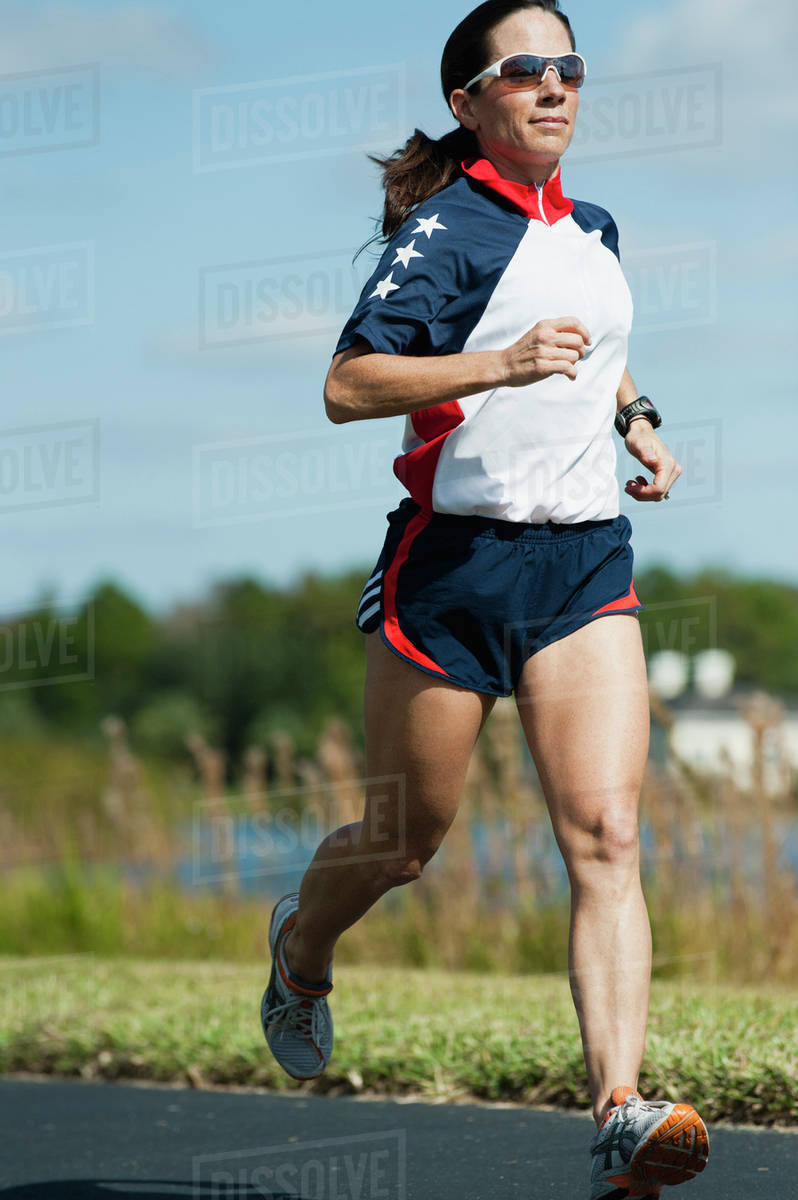 Woman running - Stock Photo - Dissolve