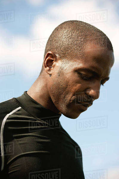 Man with head down in thought, portrait - Royalty-free Stock Photo ...