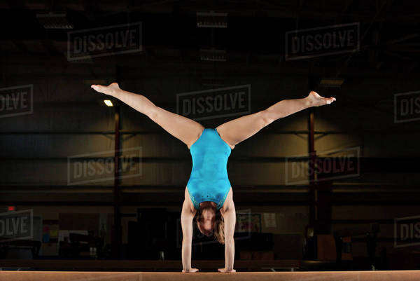 Gymnast doing handstand with legs split - Royalty-free Stock Photo ...