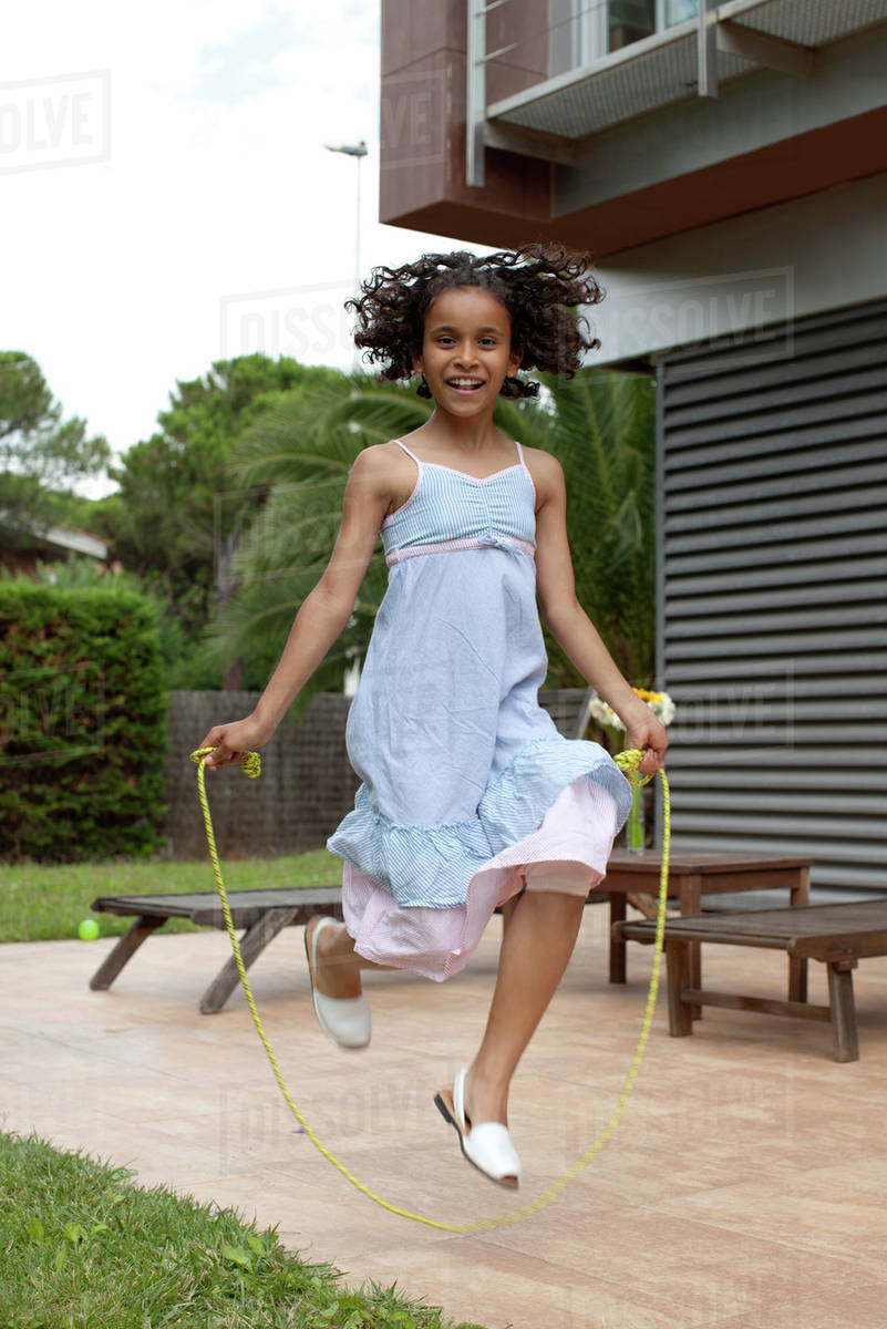 Girl jumping rope - Royalty-free Stock Photo | Dissolve