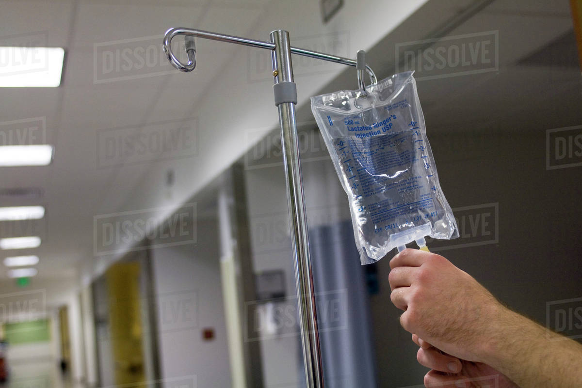 Preparing IV drip - Royalty-free Stock Photo | Dissolve