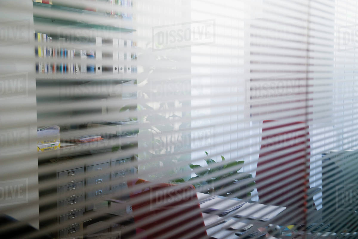 Office seen through glass wall - Royalty-free Stock Photo | Dissolve