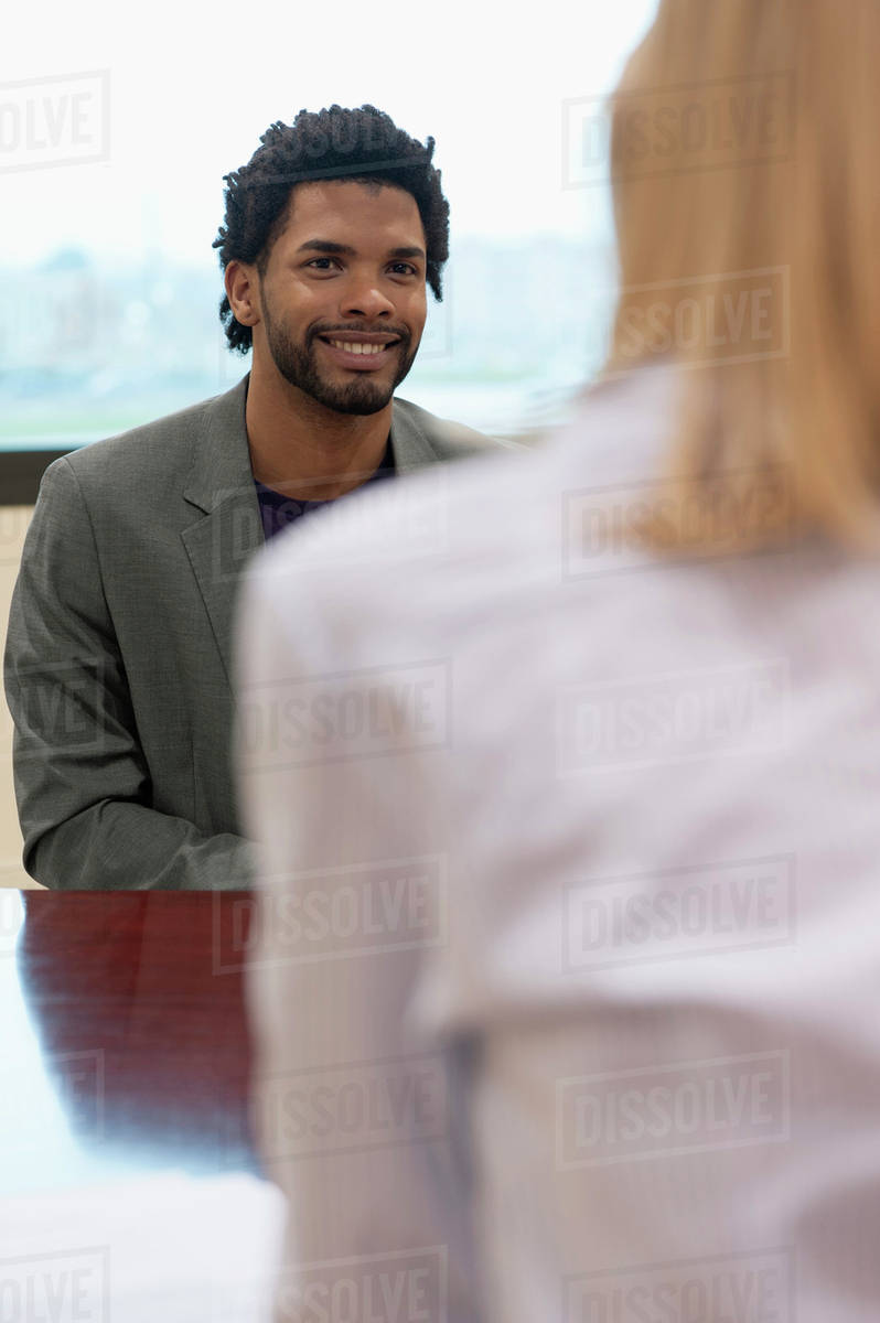 Professional man in job interview - Stock Photo - Dissolve