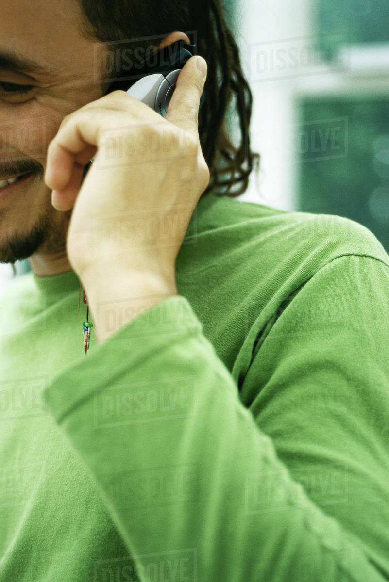 Man phoning, close-up, cropped - Royalty-free Stock Photo | Dissolve