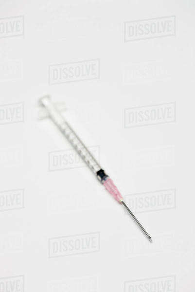 Syringe containing medication - Royalty-free Stock Photo | Dissolve