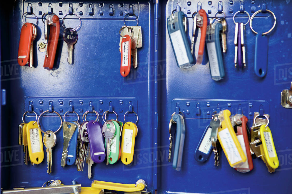 Keys organized in key cabinet - Royalty-free Stock Photo | Dissolve