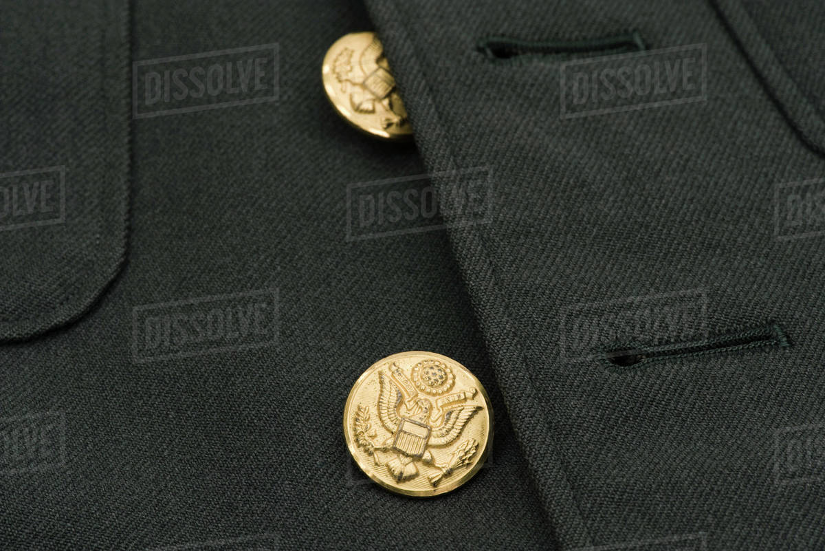 Brass buttons of military dress uniform jacket - Stock Photo - Dissolve