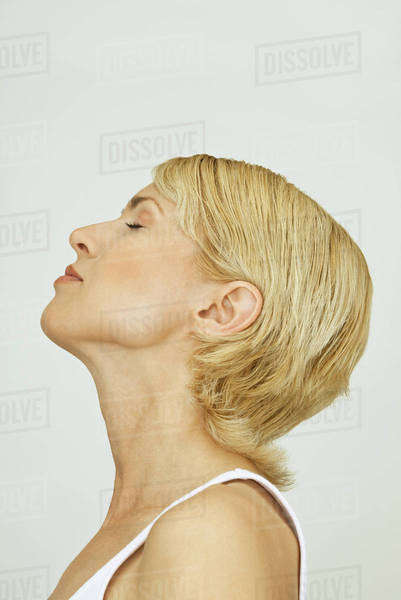 Mid-adult woman, profile - Royalty-free Stock Photo | Dissolve