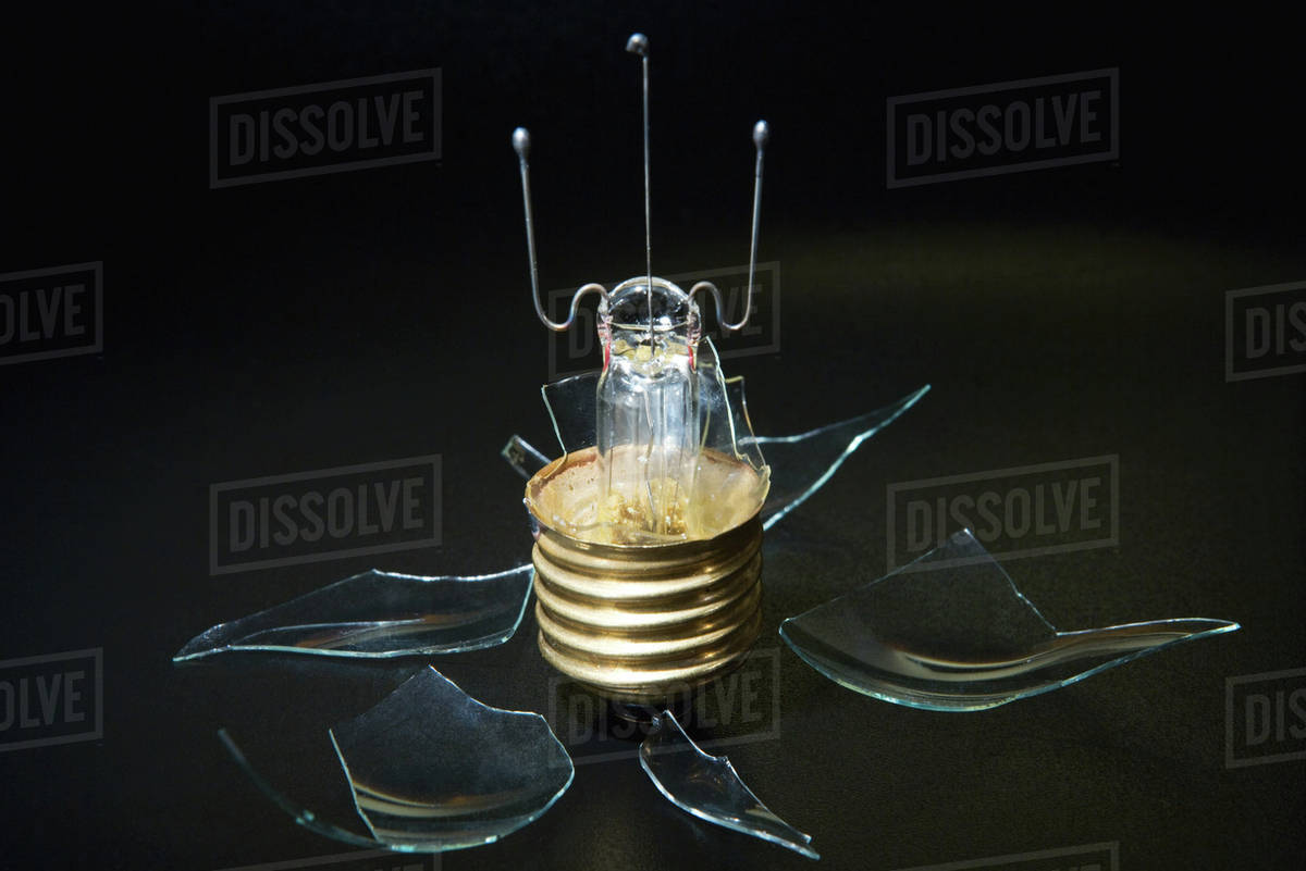 Broken light bulb, close-up - Royalty-free Stock Photo | Dissolve