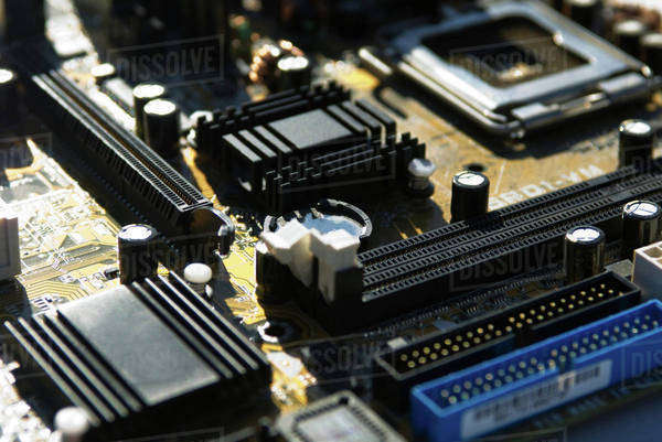 Computer motherboard, extreme close-up - Stock Photo - Dissolve