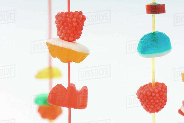 Colorful candy hanging on strings, close-up - Royalty-free Stock Photo ...
