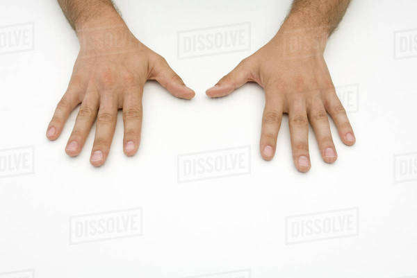 Man's hands, side by side - Royalty-free Stock Photo | Dissolve