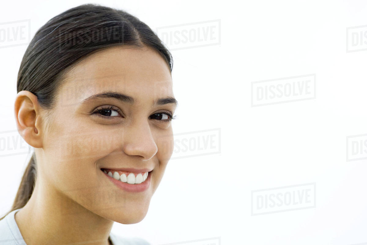 Young woman smiling at camera, portrait - Royalty-free Stock Photo ...