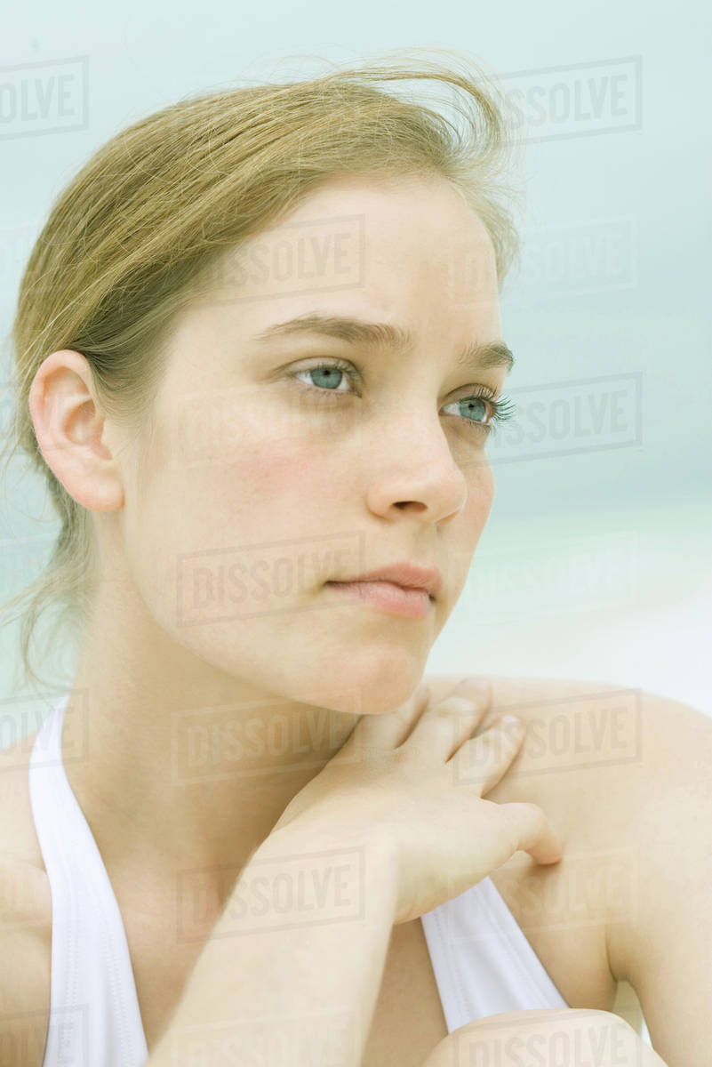 Young woman, head and shoulders, portrait, sea in background - Royalty ...
