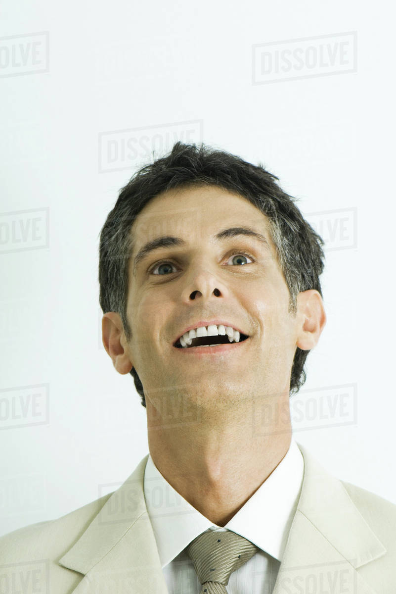 Man, head back, smiling, portrait - Royalty-free Stock Photo | Dissolve
