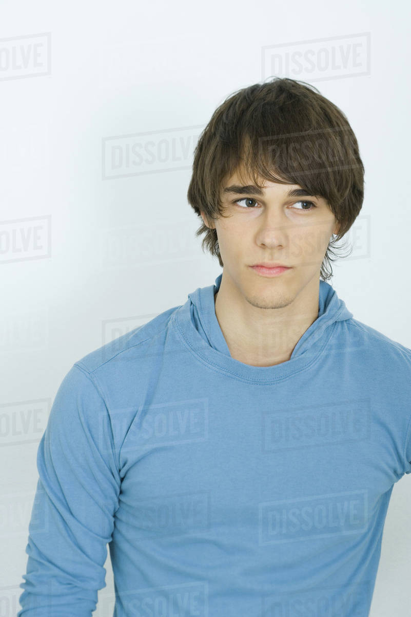 Young man, glancing to the side, portrait - Royalty-free Stock Photo ...