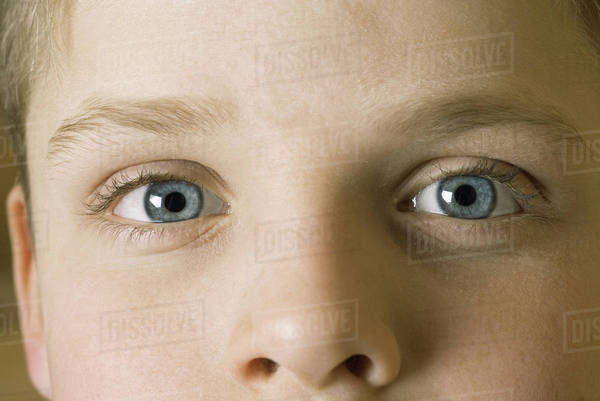 Boy's face, looking at camera, cropped view - Royalty-free Stock Photo ...