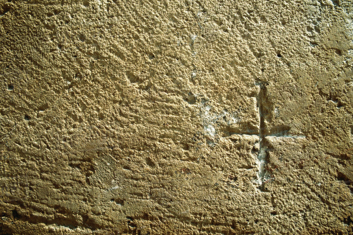 Cross carved into wall, close-up - Royalty-free Stock Photo | Dissolve