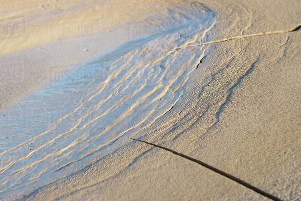 Drying mud with cracks, close-up - Royalty-free Stock Photo | Dissolve