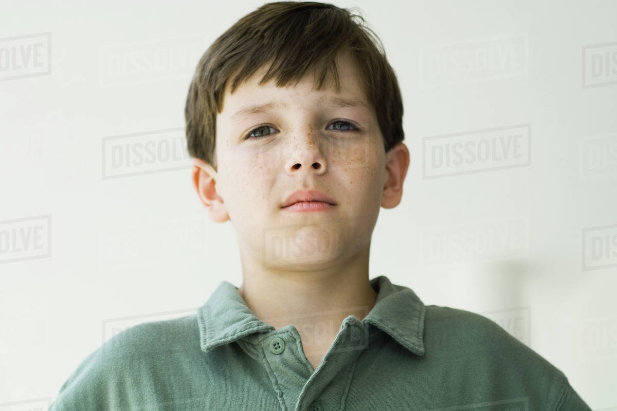 Boy, looking at camera, portrait - Royalty-free Stock Photo | Dissolve