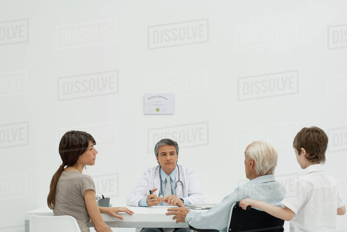 Doctor talking with senior patient and his family - Royalty-free Stock ...
