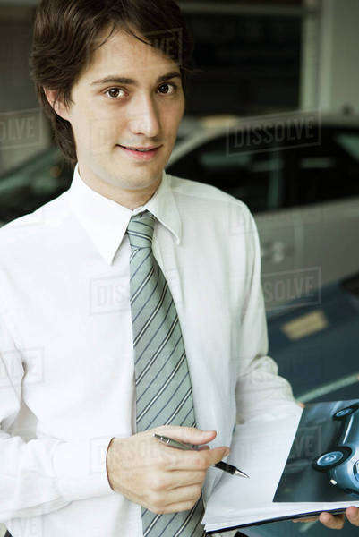 Salesman with brochure - Royalty-free Stock Photo | Dissolve