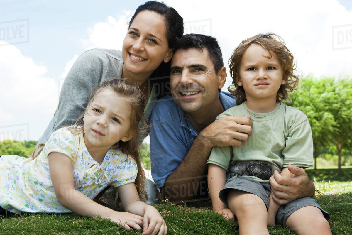 Family relaxing together outdoors, portrait - Royalty-free Stock Photo ...