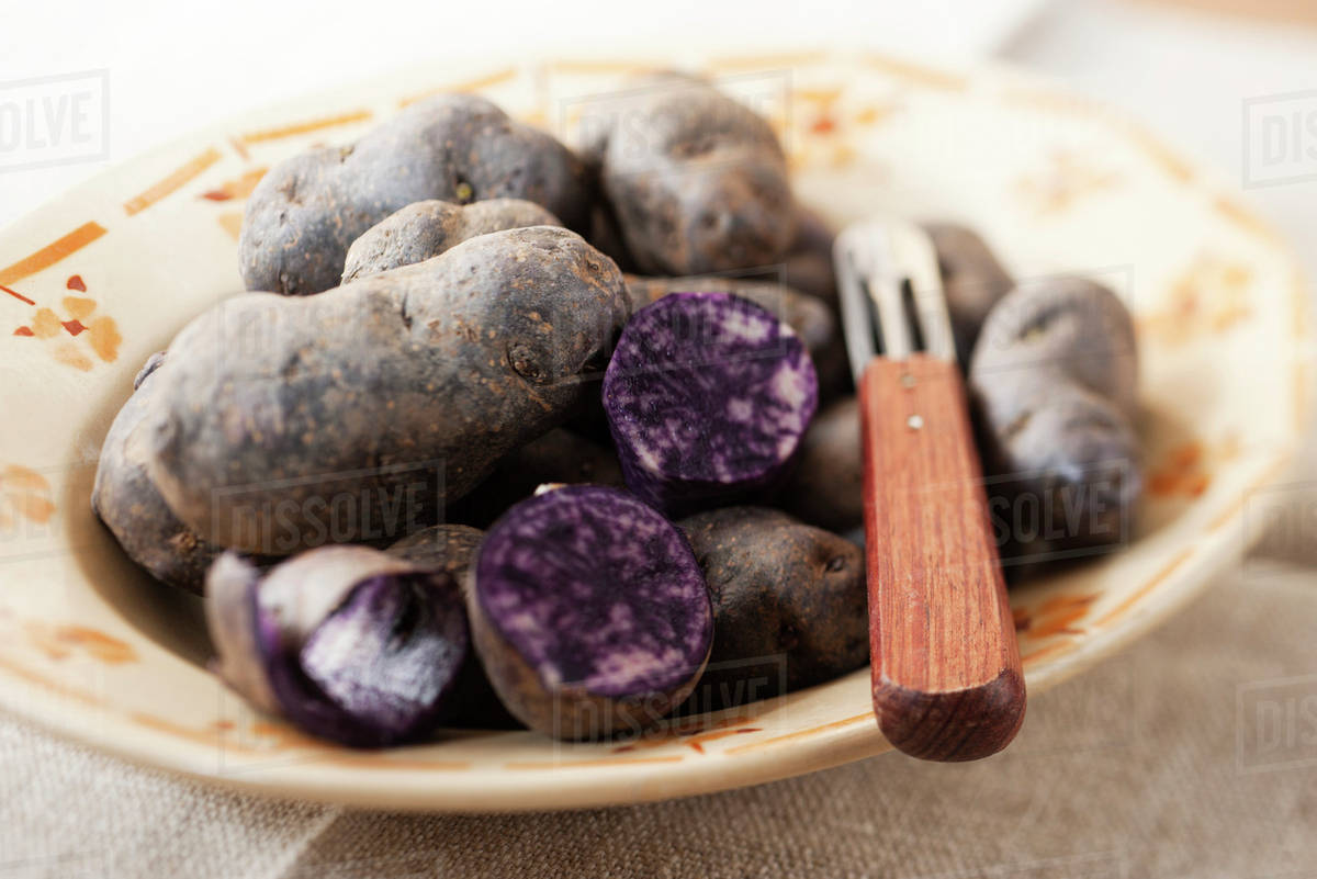 Purple potatoes - Royalty-free Stock Photo | Dissolve