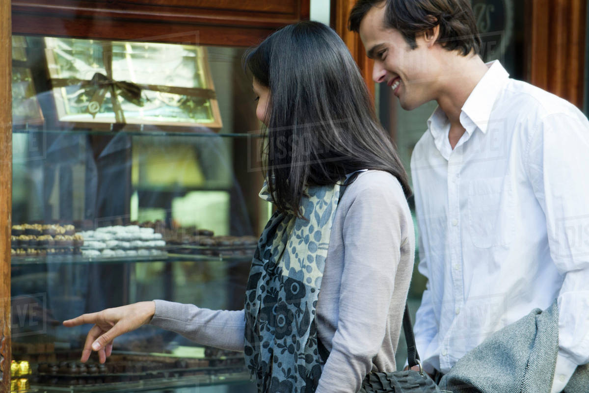 Couple window shopping - Stock Photo - Dissolve