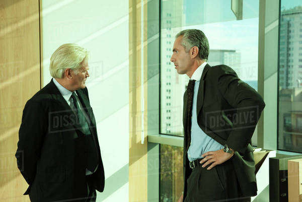 Executives having private conversation - Royalty-free Stock Photo ...