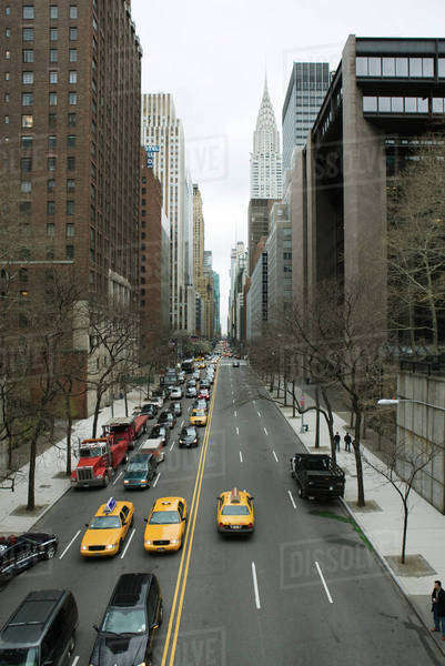 Traffic on busy city street, high angle view - Stock Photo - Dissolve