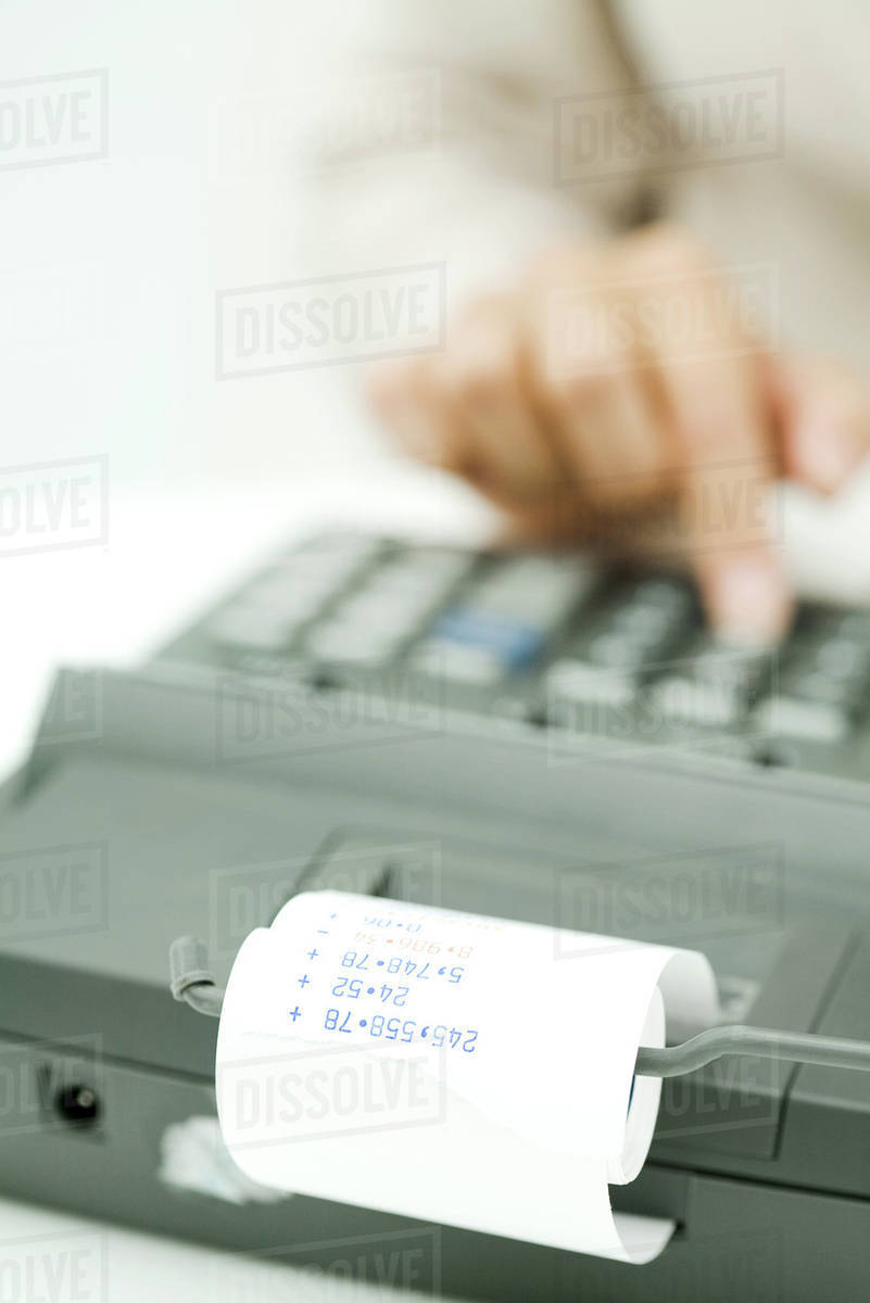 Person using adding machine, cropped view - Royalty-free Stock Photo ...