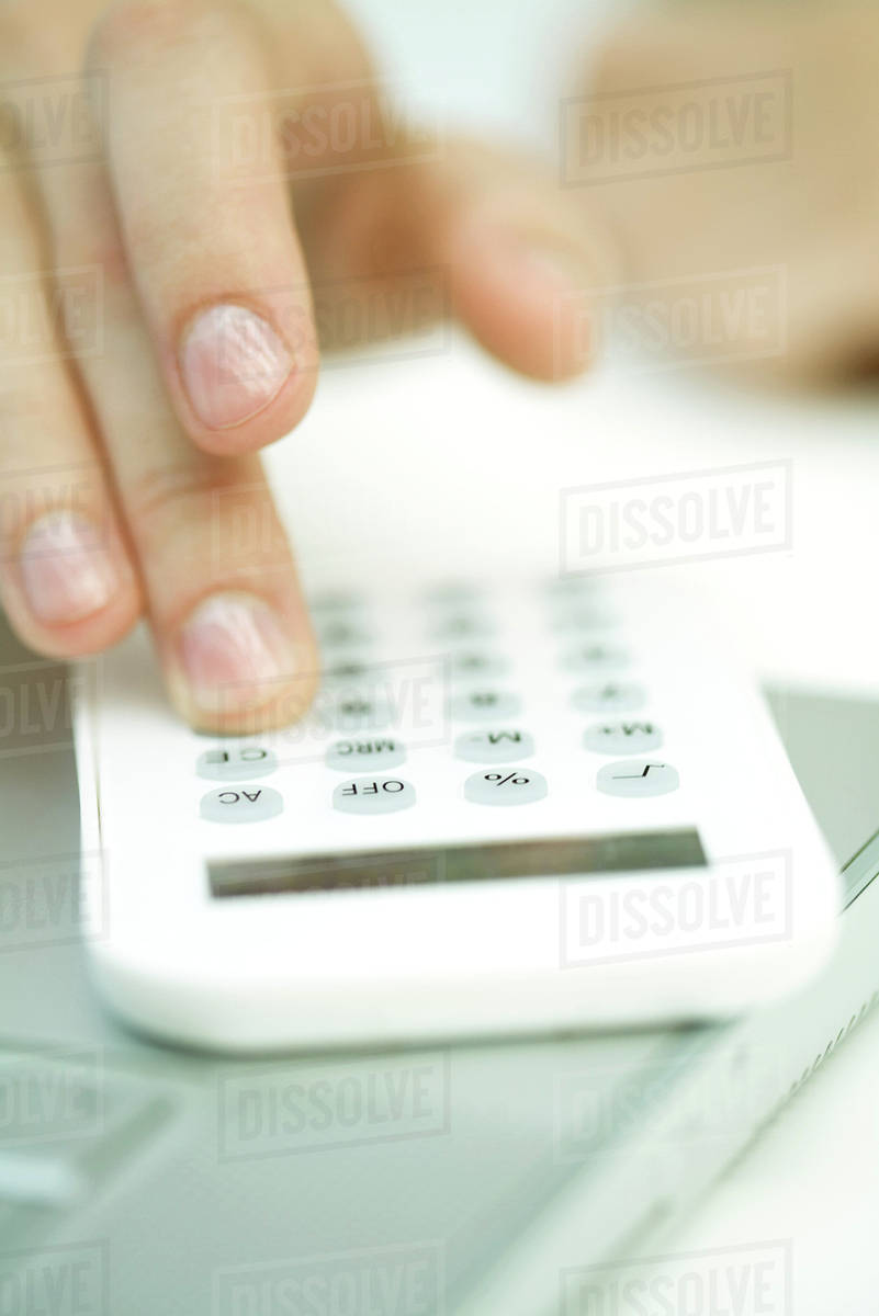 Woman's hand using calculator, extreme close-up - Royalty-free Stock ...