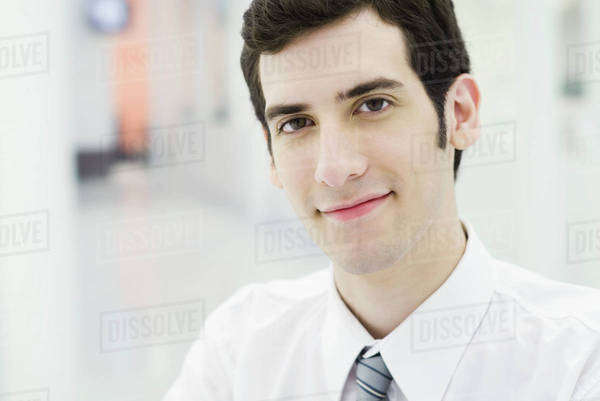 Professional man smiling at camera, portrait - Royalty-free Stock Photo ...
