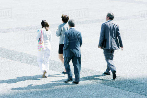 Pedestrians walking across public square - Royalty-free Stock Photo ...