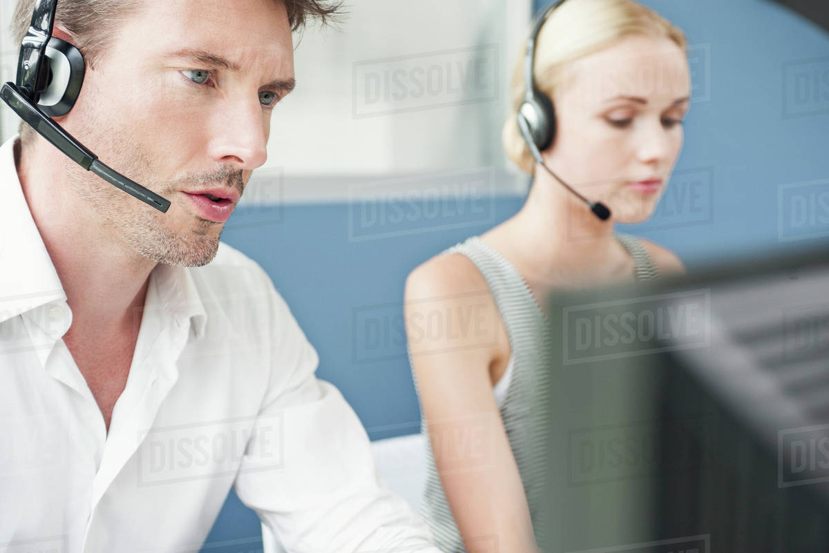 Working in call center - Royalty-free Stock Photo | Dissolve