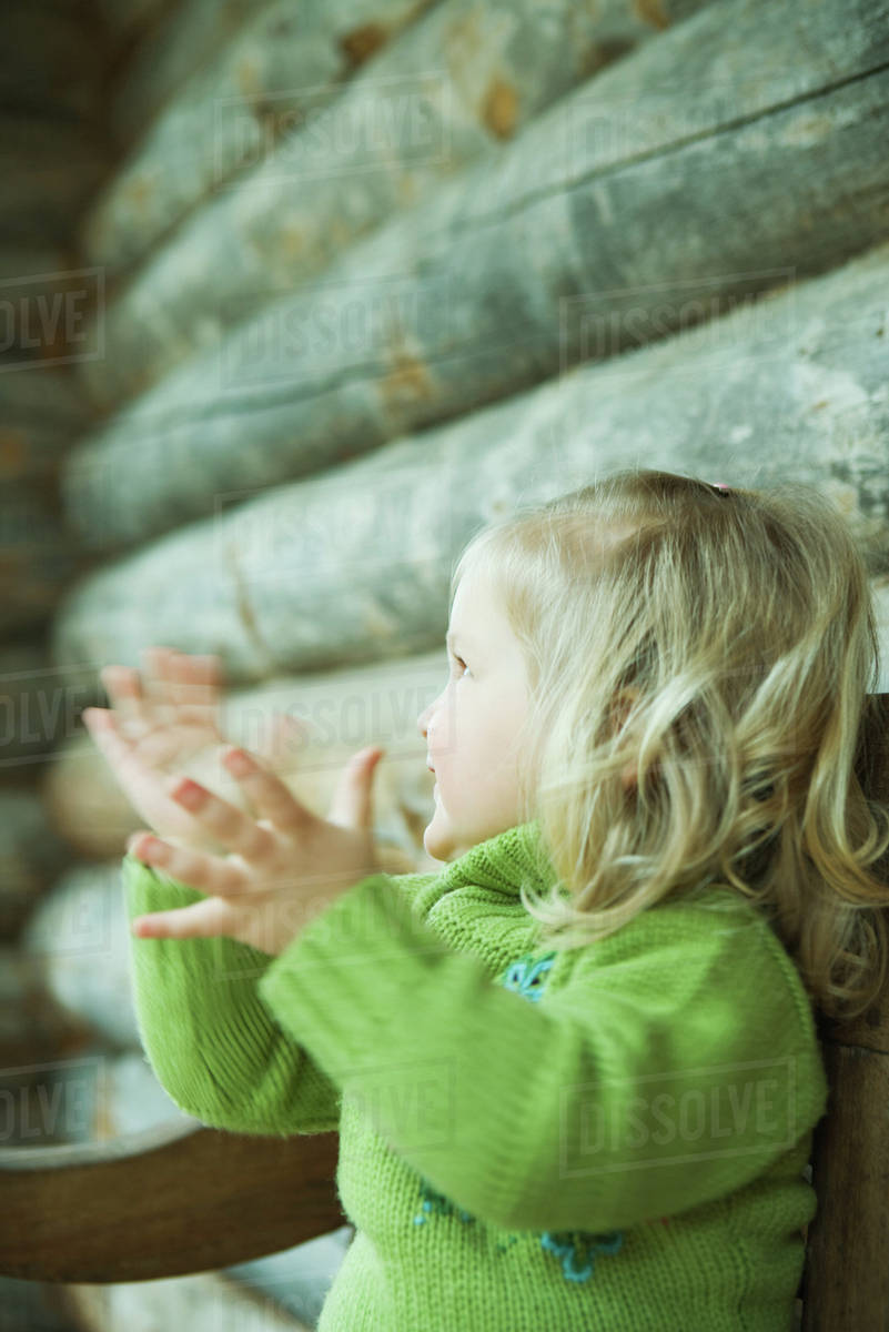 Toddler girl clapping hands, side view, blurred motion - Royalty-free ...