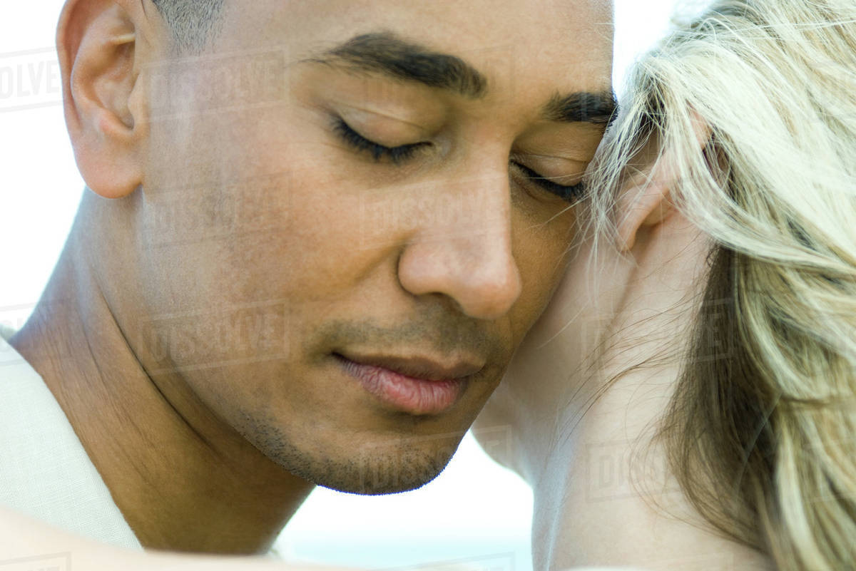 Couple cheek to cheek, man's eyes closed, close-up - Royalty-free Stock ...