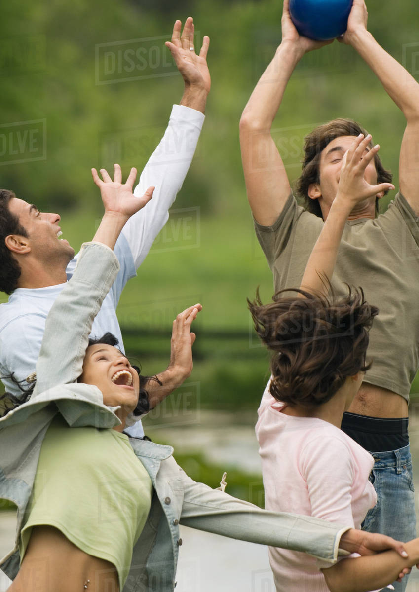 Group of young adult friends playing with ball - Royalty-free Stock ...