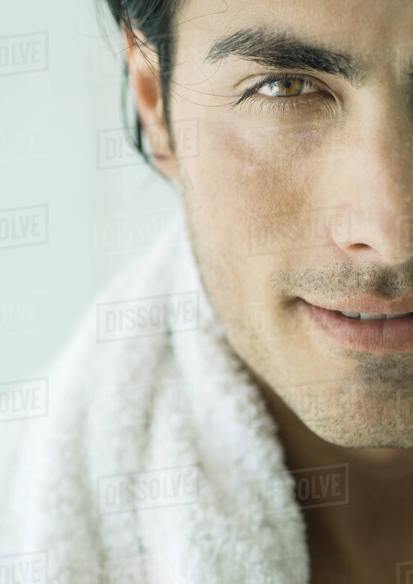 Man with towel around neck, cropped close-up - Royalty-free Stock Photo ...