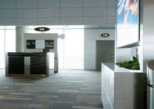 Check-in counter at boarding gate - Stock Photo - Dissolve