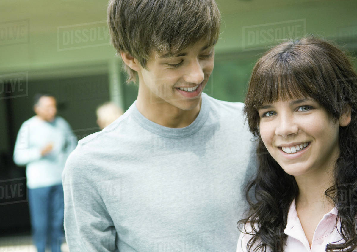 Teenage boy and girl, portrait - Royalty-free Stock Photo | Dissolve